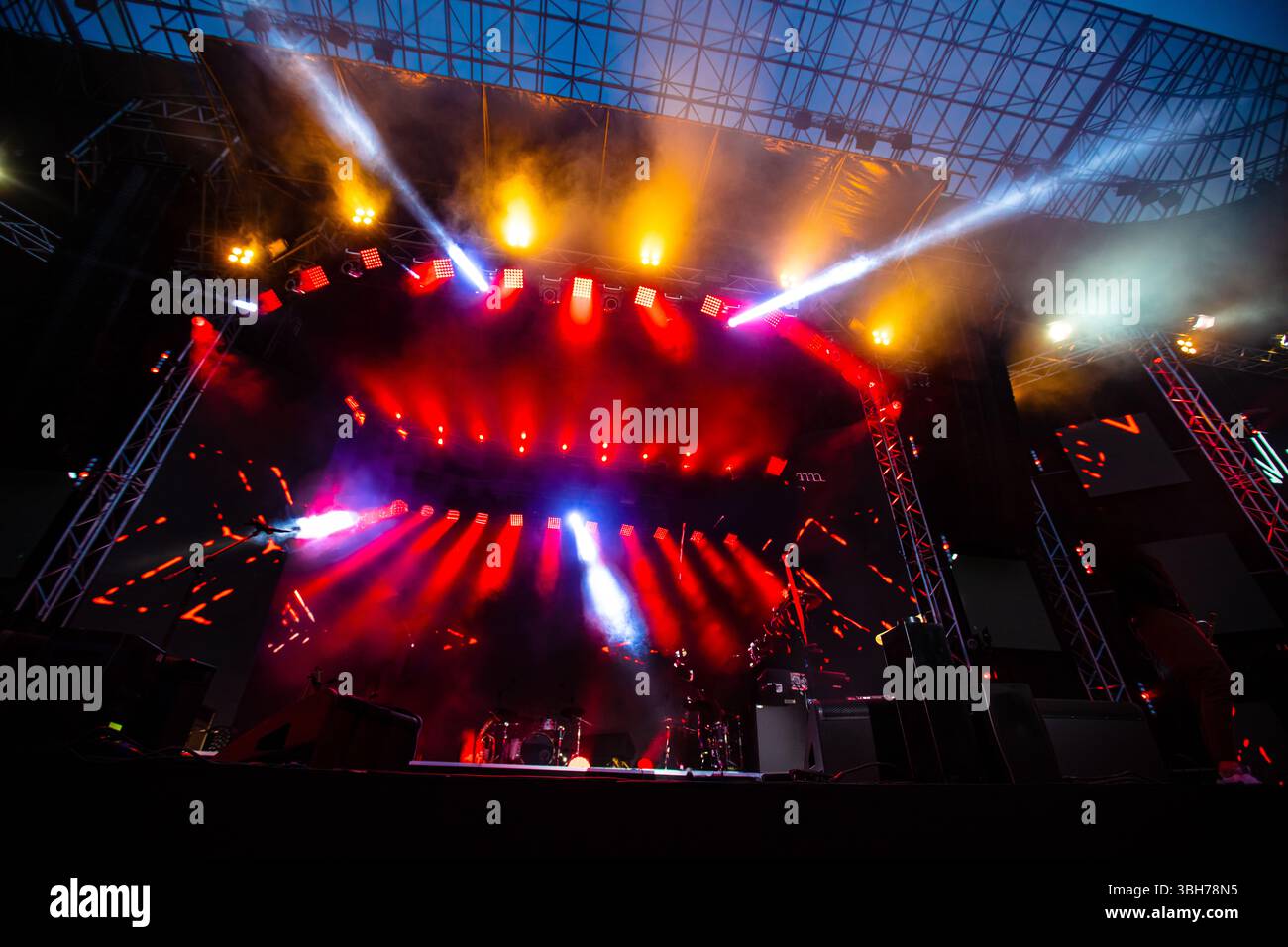 Dynamic Rock Concert Stage with Pyrotechnics and Lights Stock Photo - Alamy