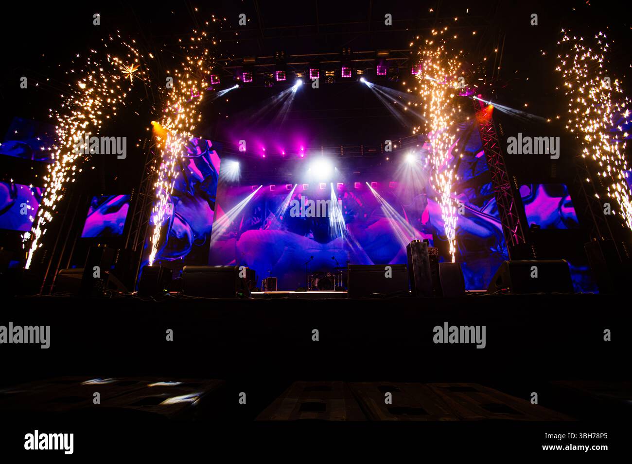 Dynamic Concert Stage with Pyrotechnics and LED Screens Stock Photo - Alamy