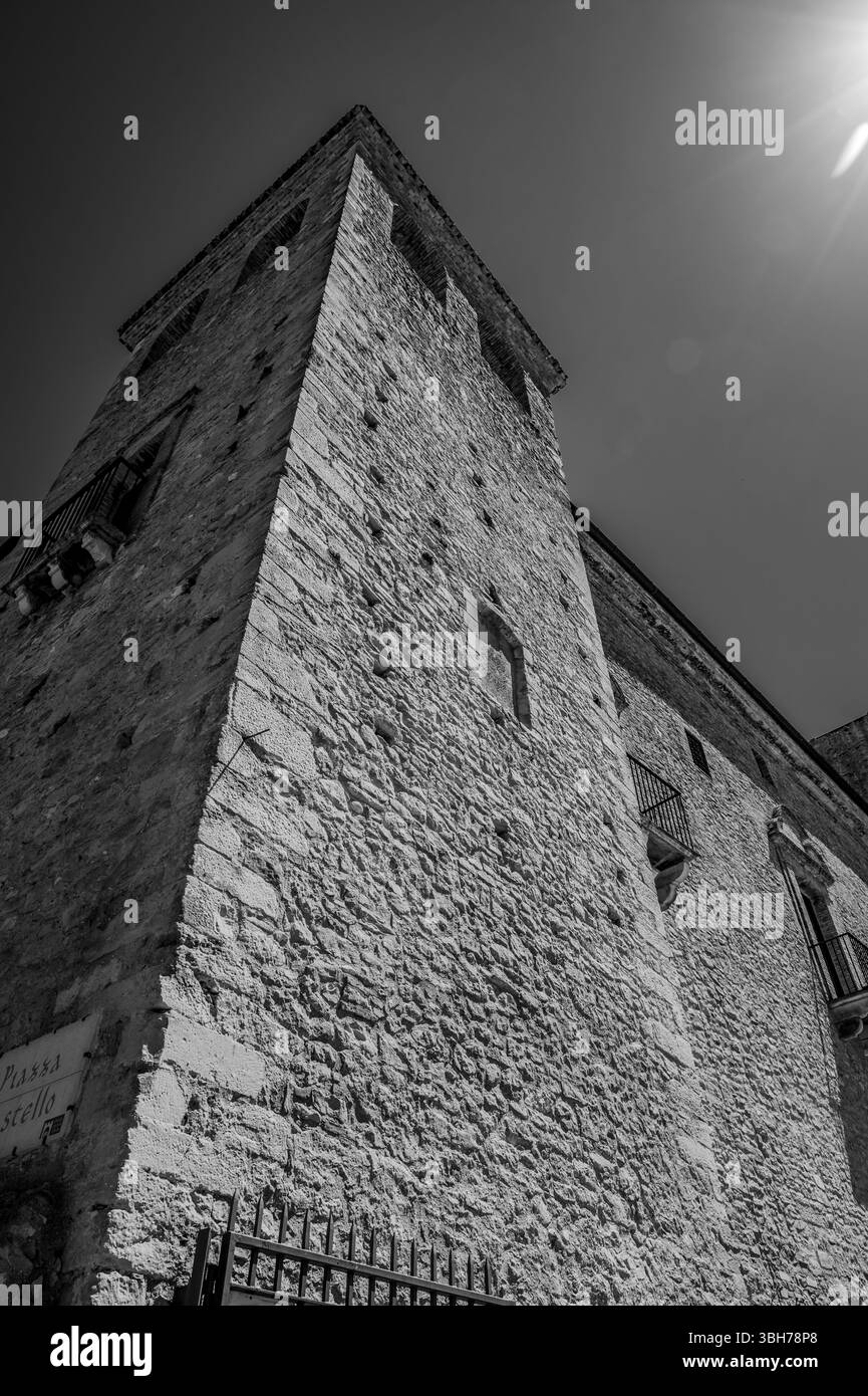 View of castle fortification wall with green grass and garden Black and ...