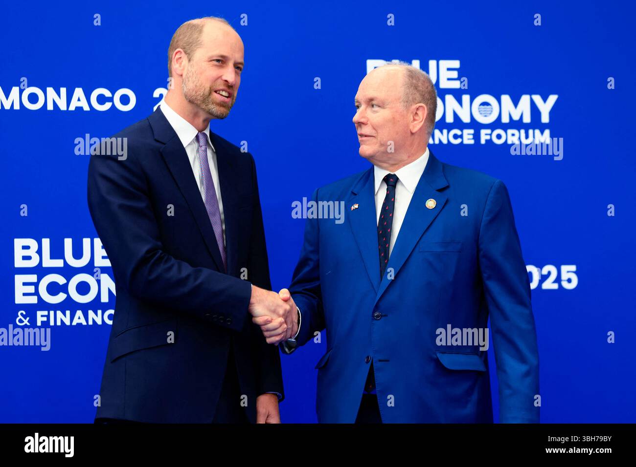 The Prince of Wales is welcomed by Prince Albert II of Monaco whilst ...