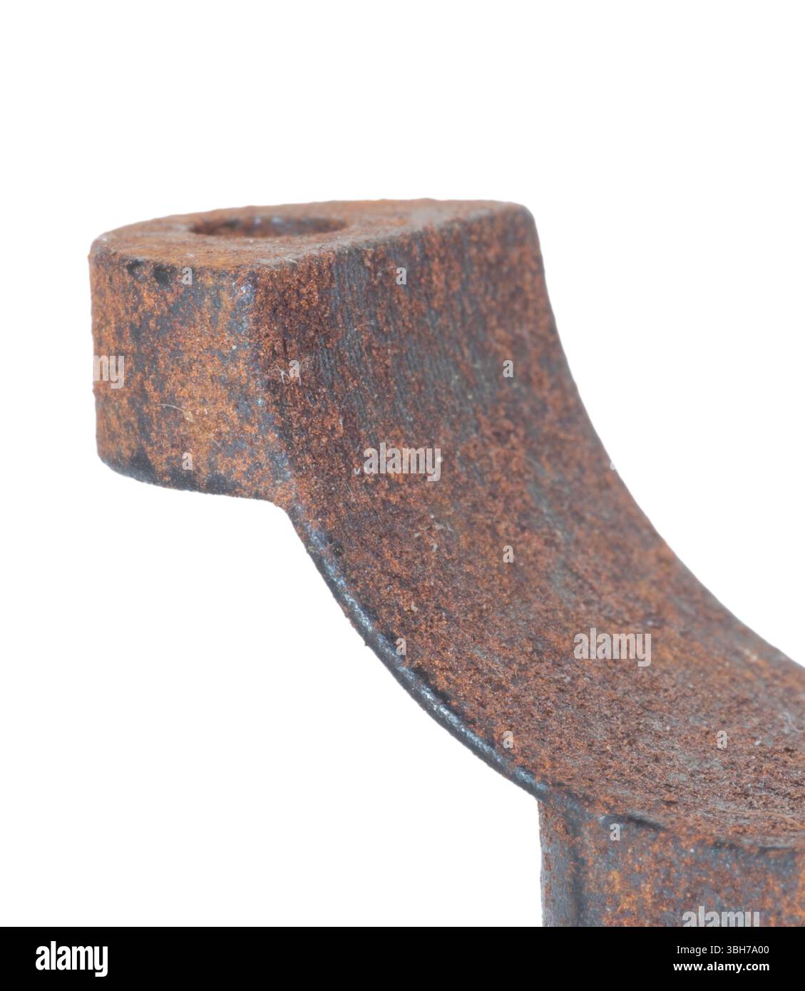 Isolated old riflescope base that is so covered in rust it can no ...