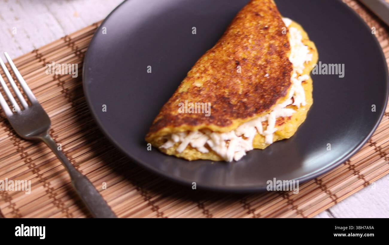 Corn cachapas with white cheese, typical Venezuelan dish Stock Photo ...
