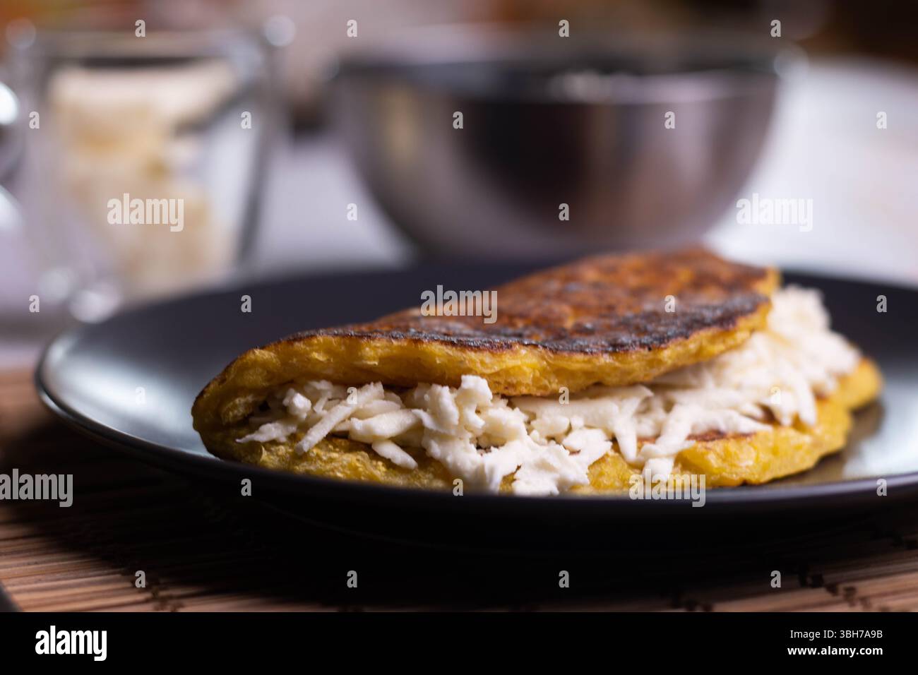 Corn cachapas with white cheese, typical Venezuelan dish Stock Photo ...