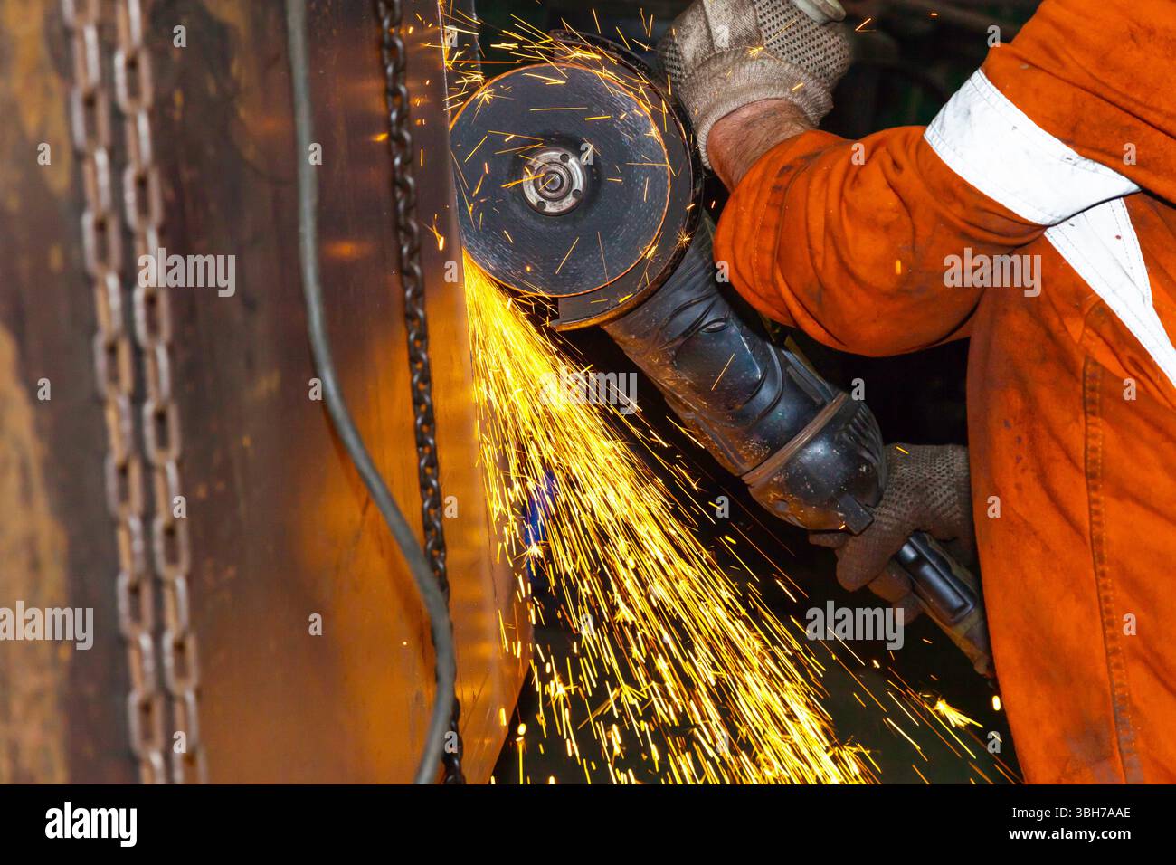 Production worker man cuts sheet hi-res stock photography and images ...