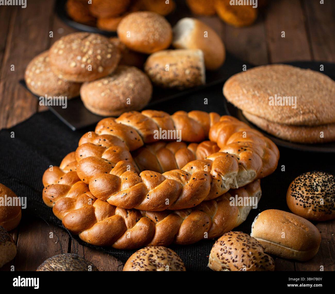 Classic baguette. Braided bread loaf. Majdal-style bread rich in ...