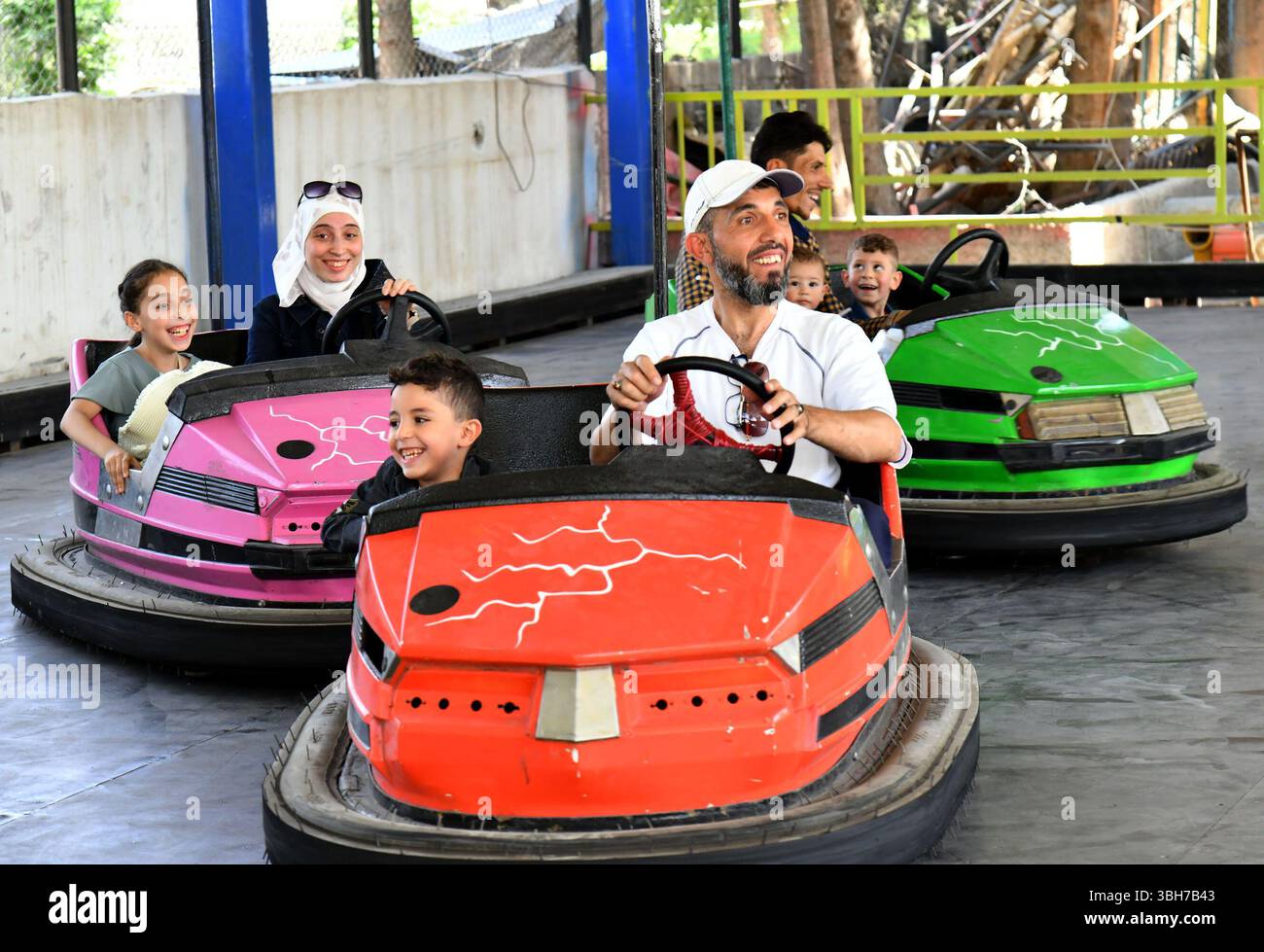 Damascus, Syria. 7th June, 2025. People have fun at a theme park during ...