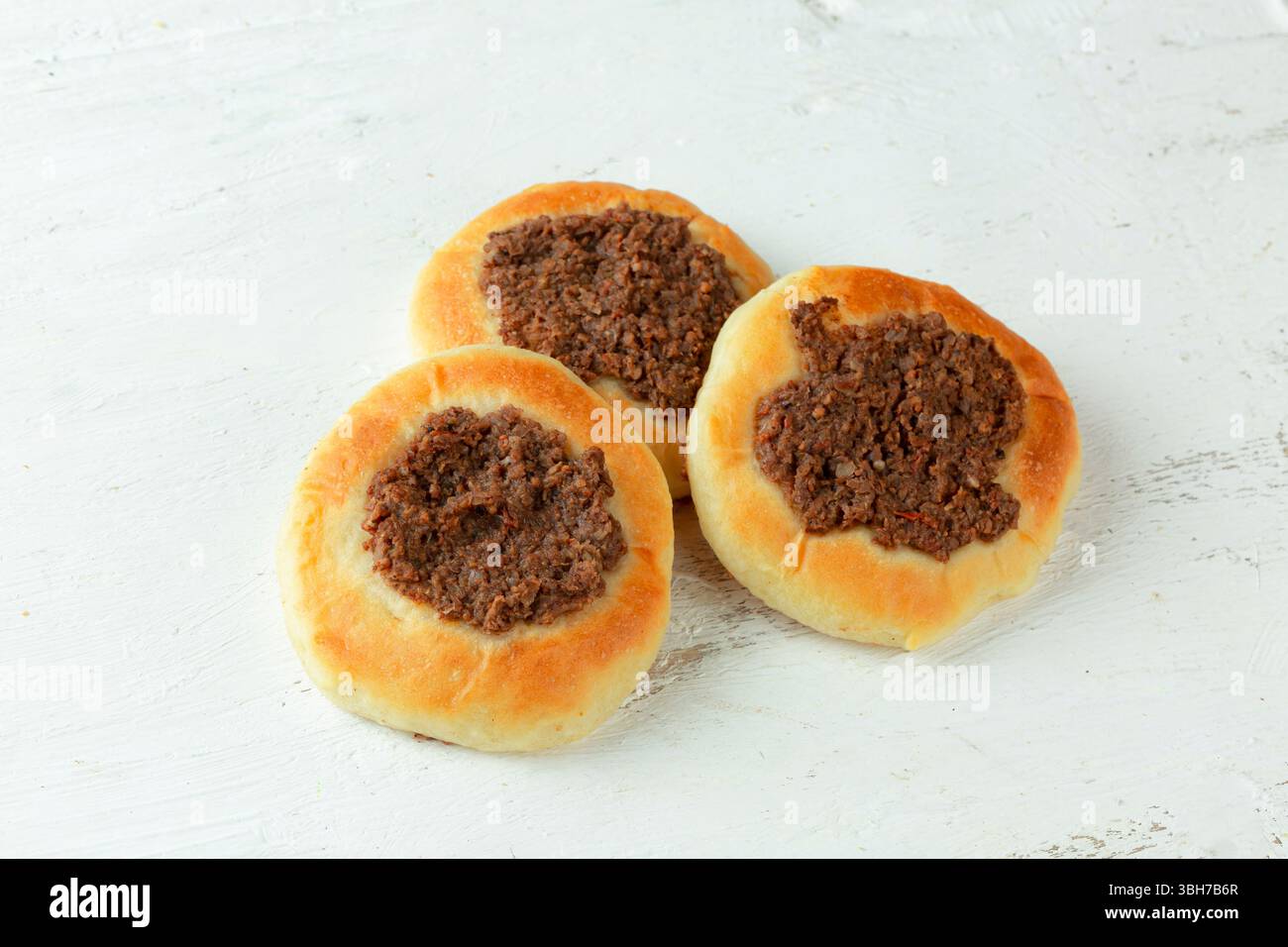 Ground meat pastries with onion,Meat and dough pastries, White ...