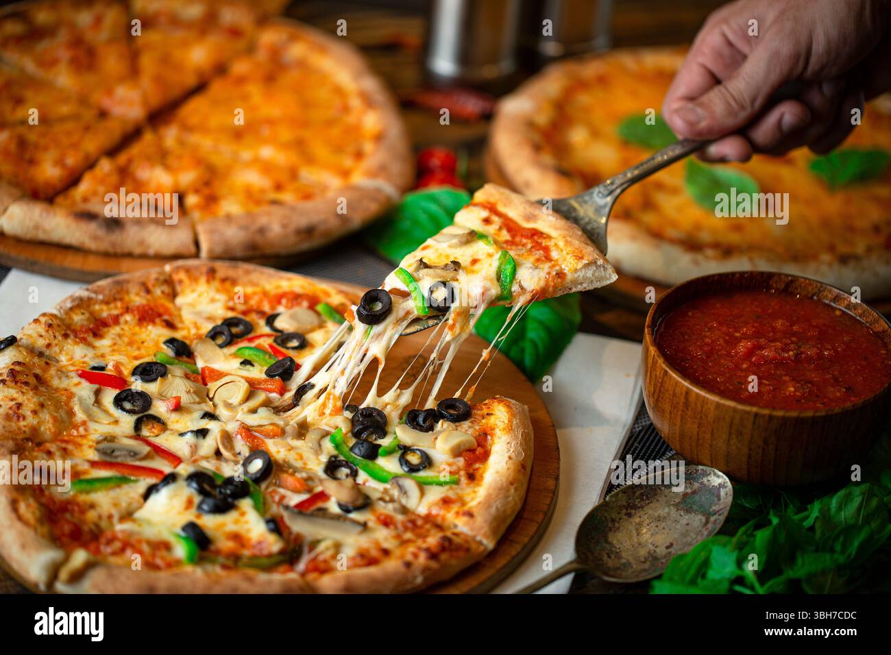 Cheesy pizza slice savory hi-res stock photography and images - Alamy