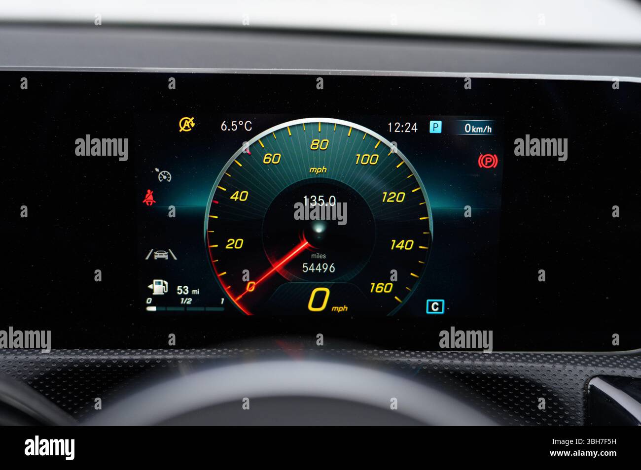 A car dashboard shows the speedometer Stock Photo - Alamy