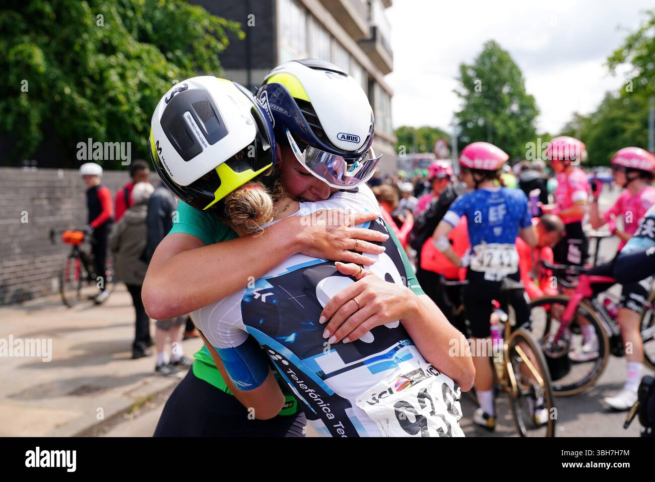 Cat Ferguson of Movistar Team is consoled after finishing second ...