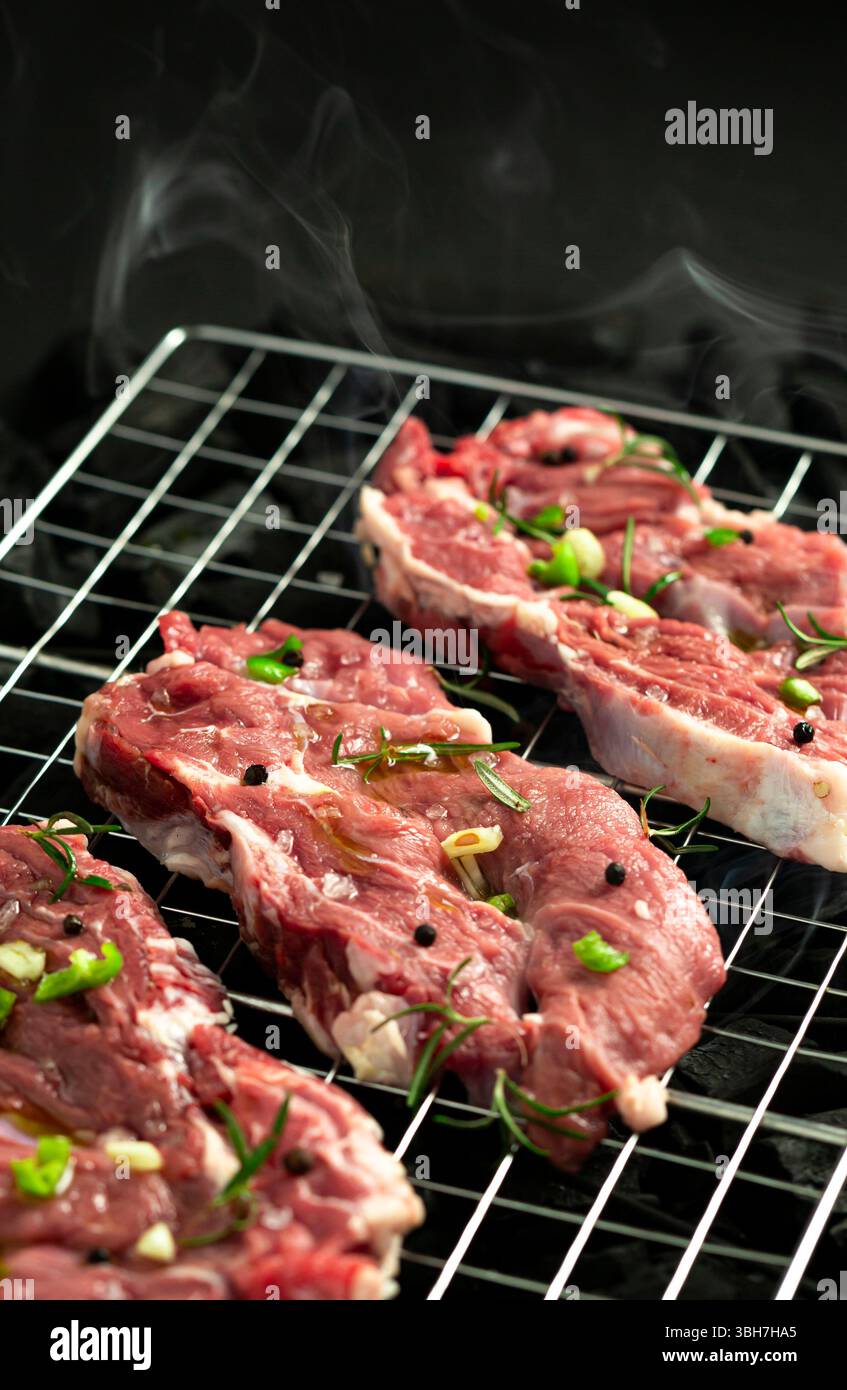 Fresh veal steak on charcoal grill Stock Photo - Alamy