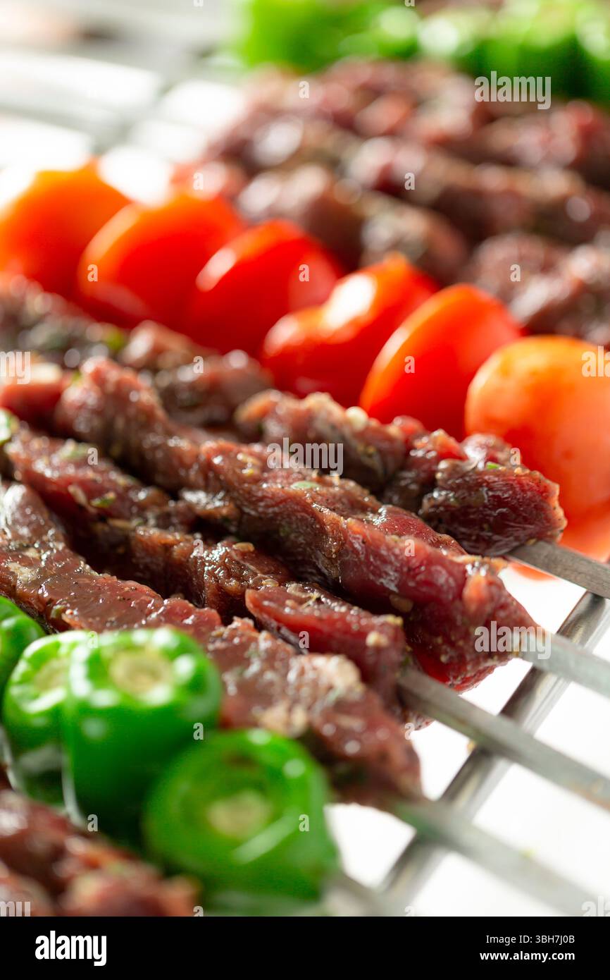 Cooking skewered meat on charcoal hi-res stock photography and images ...
