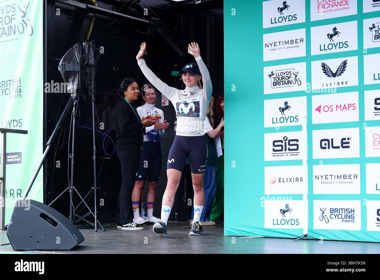 Cat Ferguson of Movistar Team heads out to collect the young rider ...