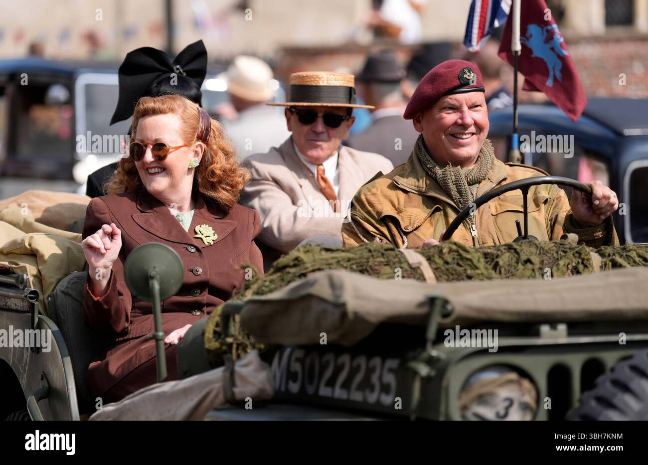 Military vehicles take part in a motorcade along the High street in ...