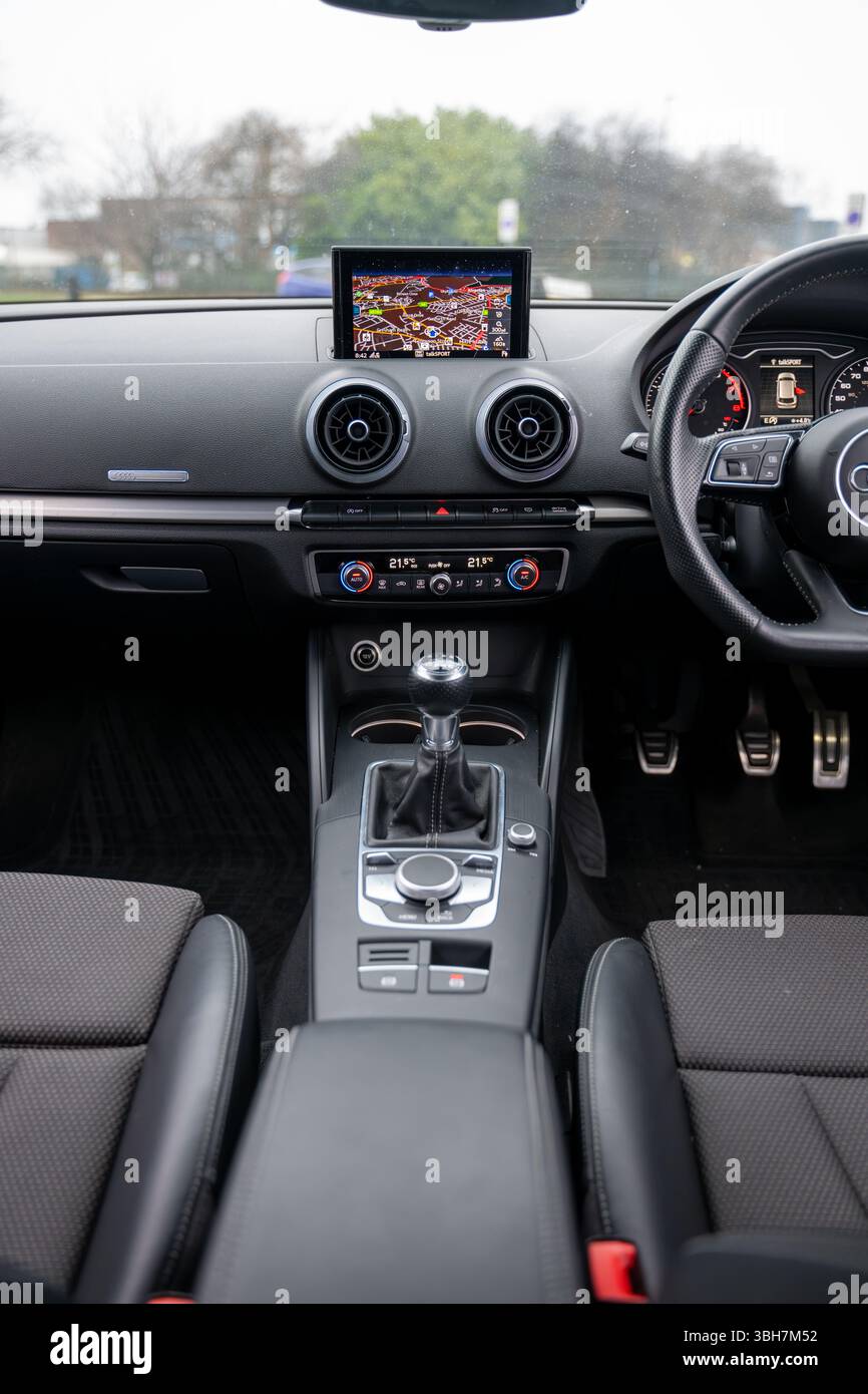 This image showcases the modern dashboard of an Audi vehicle, featuring ...