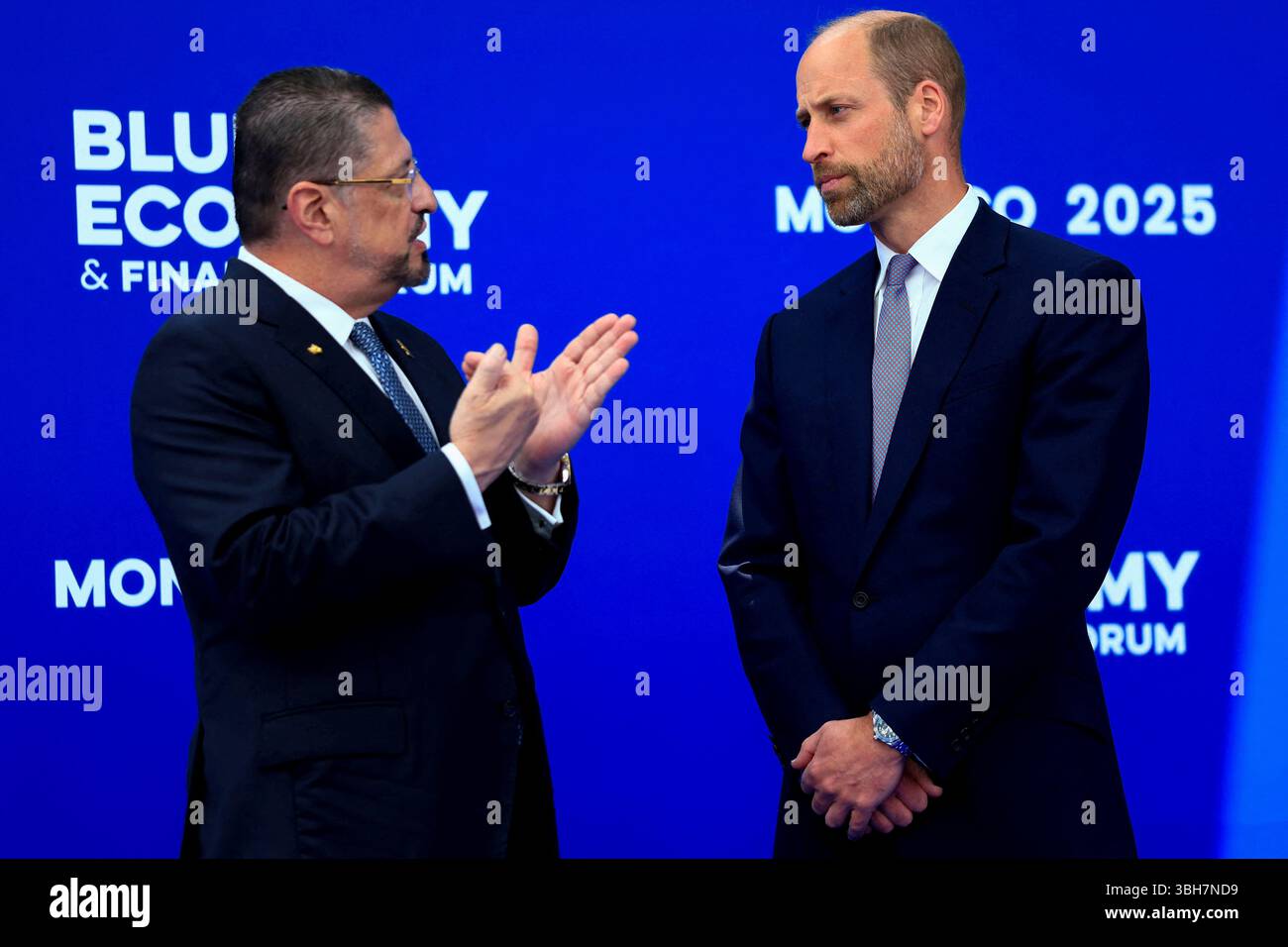 Britain's Prince William, right, meets with Costa Rica's President Rodrigo Chaves Robles, left ...