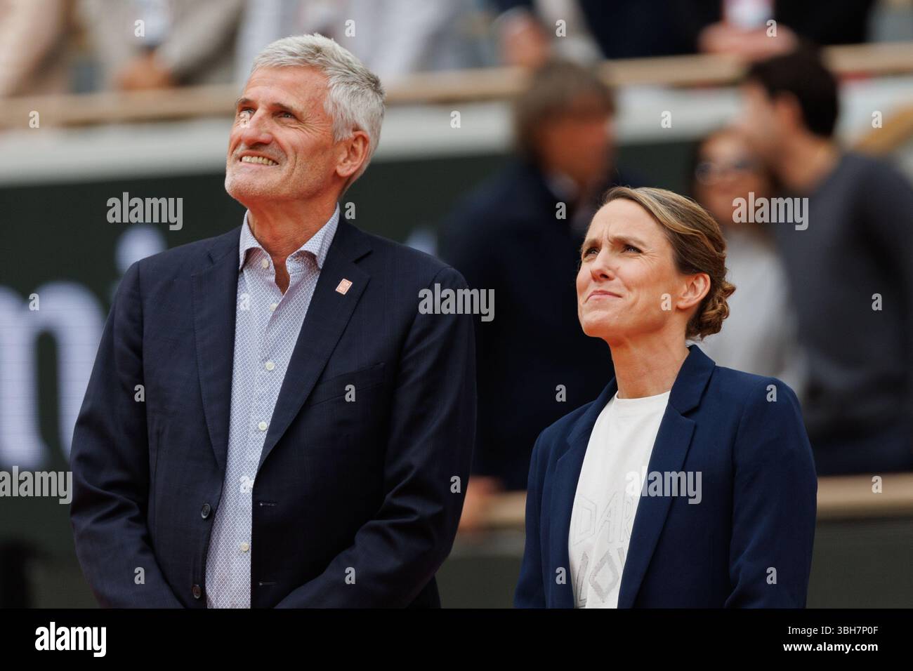 Justine Henin of Belgium and Gilles Moretton during the Roland-Garros ...