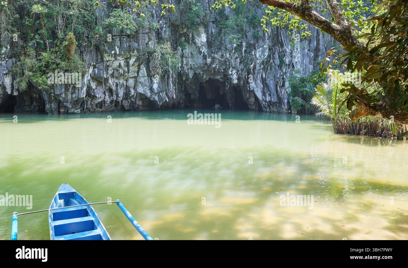 Boat at the entrance to the underwater river at the Puerto Princesa ...
