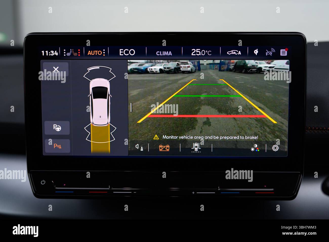 This image shows a cars infotainment screen while parking, featuring ...