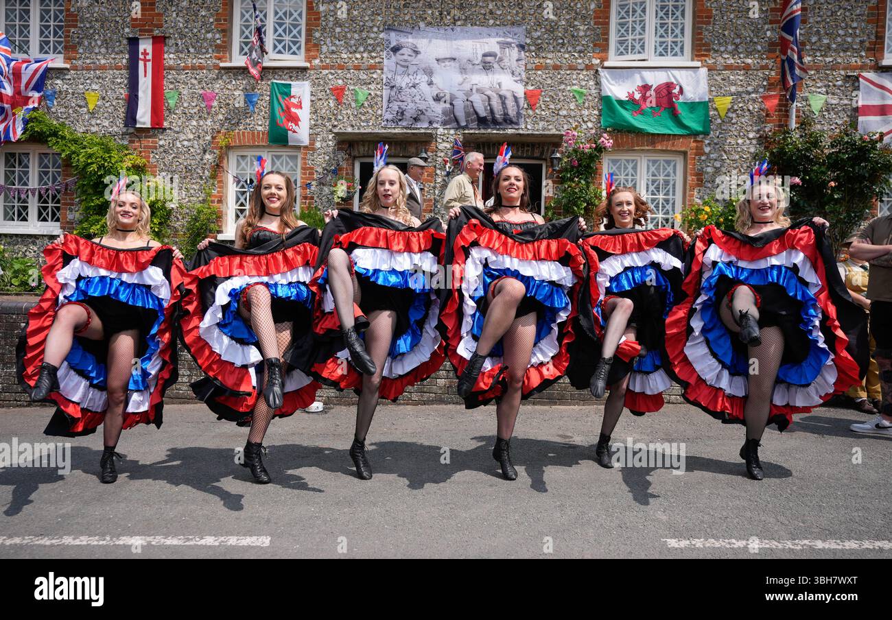 Members of The Butterflies event dancers perform a can-can dance in ...