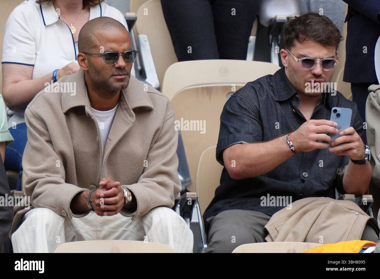 Former NBA star Tony Parker, left, and French rugby player Antoine ...