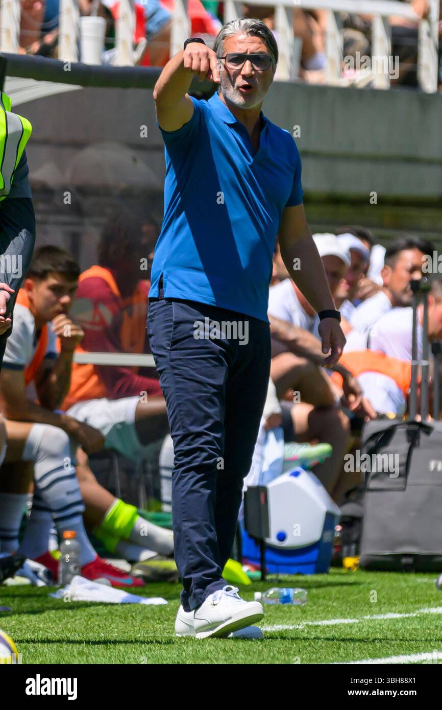 Switzerland's head coach Murat Yakin gives instructions to his players ...