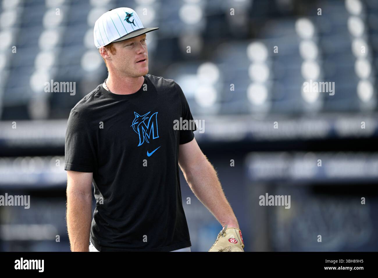 Miami Marlins first baseman Eric Wagaman warms up before a baseball ...