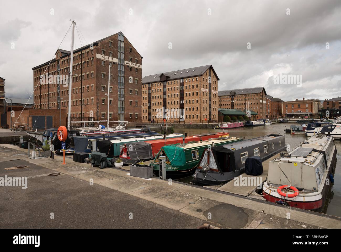 Victoria Basin, Gloucester Docks, with restored warehouses and moored pleasure boats, City of ...