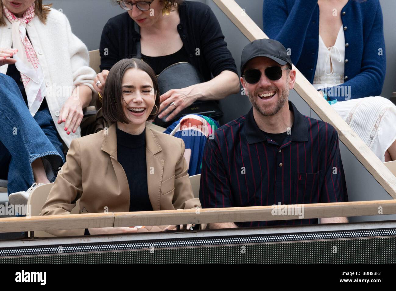 Paris, France. 8th June, 2025. Lilly Collins and Charlie McDowell ...