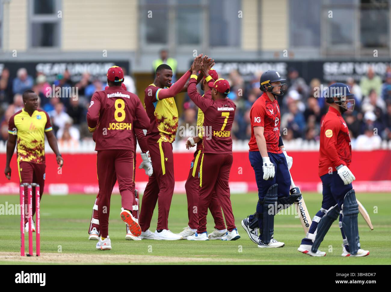 West Indies' Jason Holder celebrates the wicket of England's Jamie ...