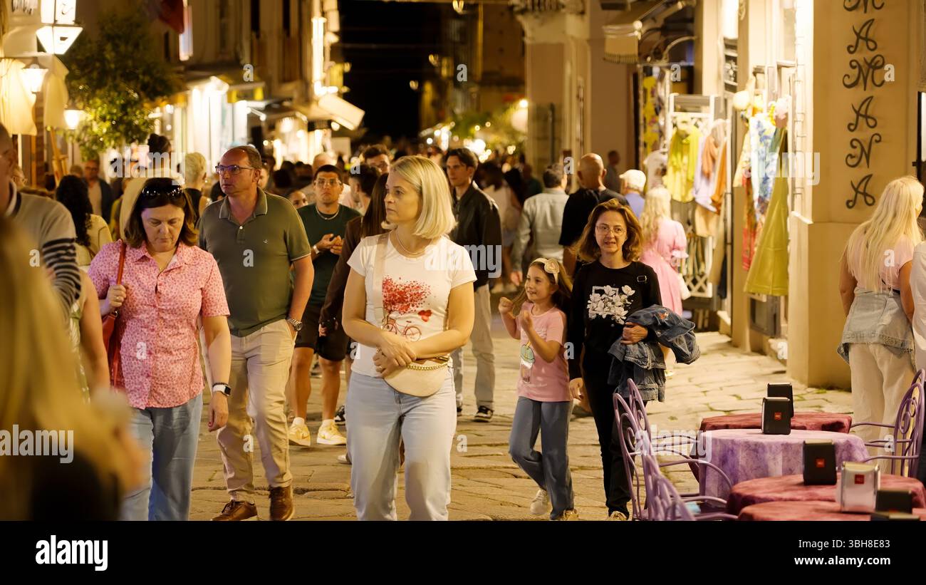 TROPEA, ITALY - JUNE 02, 2025 - Tourists walking down a crowded street ...