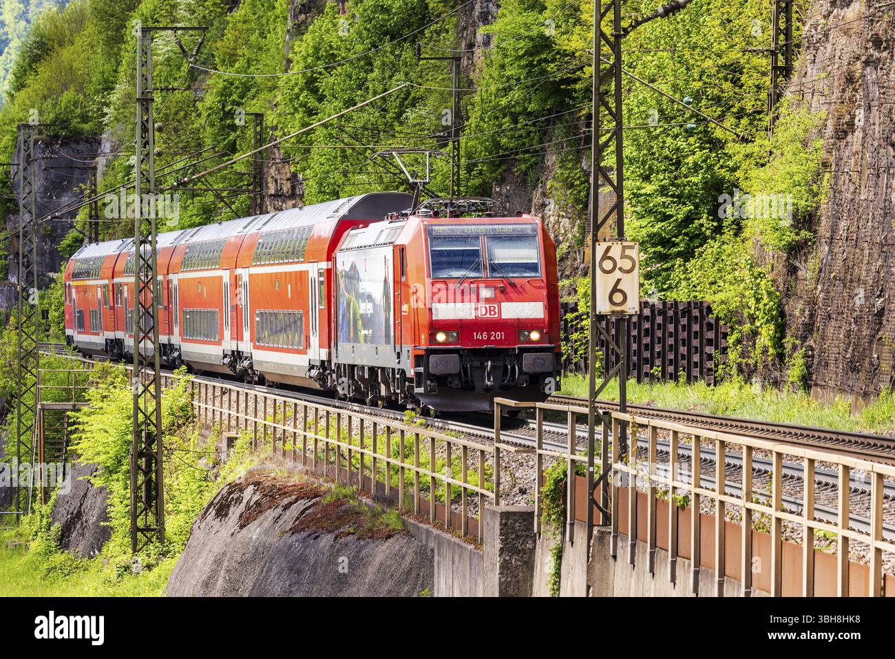 Regional express RE5 en route on the winding railway line of the ...