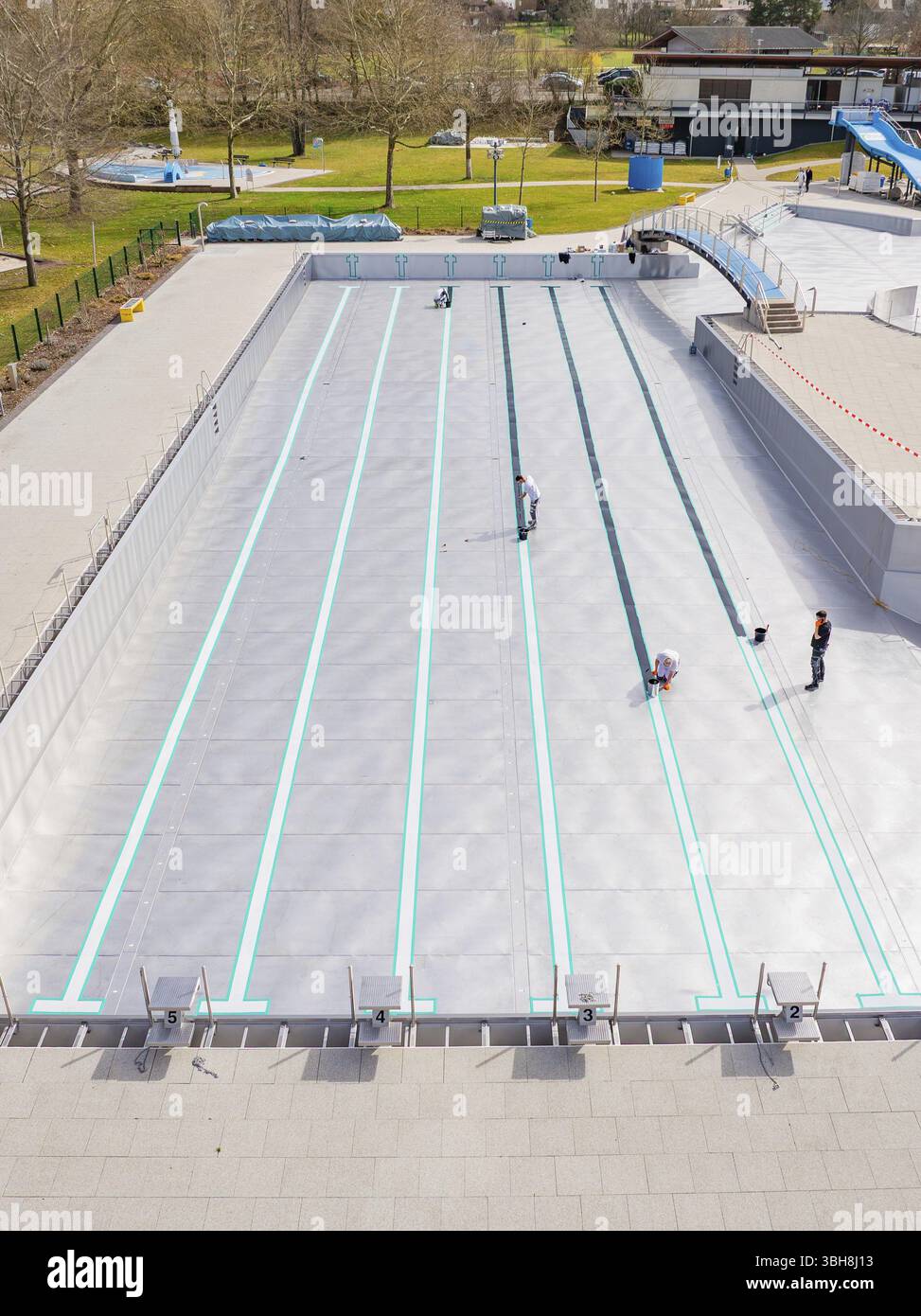 Bird's eye view of the swimming pool in a green area, renovation of the ...