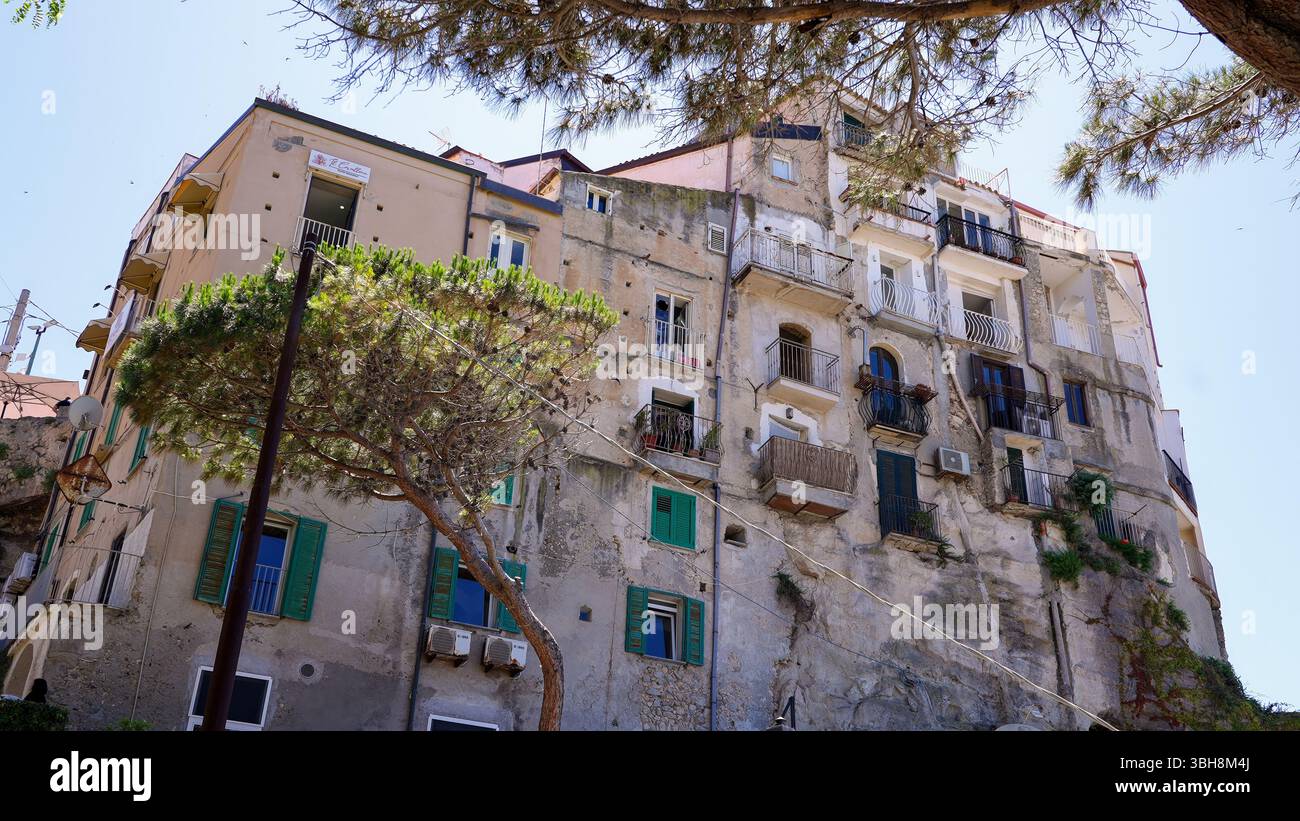 TROPEA, ITALY - JUNE 02, 2025 - Old residential buildings rising on a ...