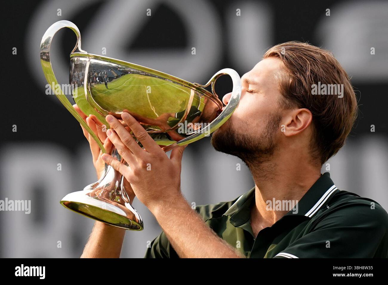 Otto Virtanen celebrates winning the Men's Final with the trophy on day ...