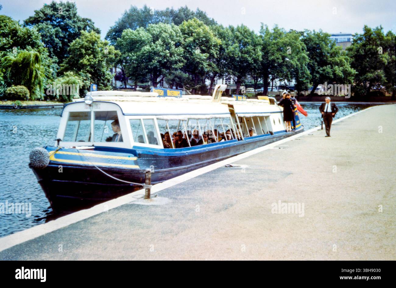 British Waterways passenger narrow boat on Regent's Canal with ...