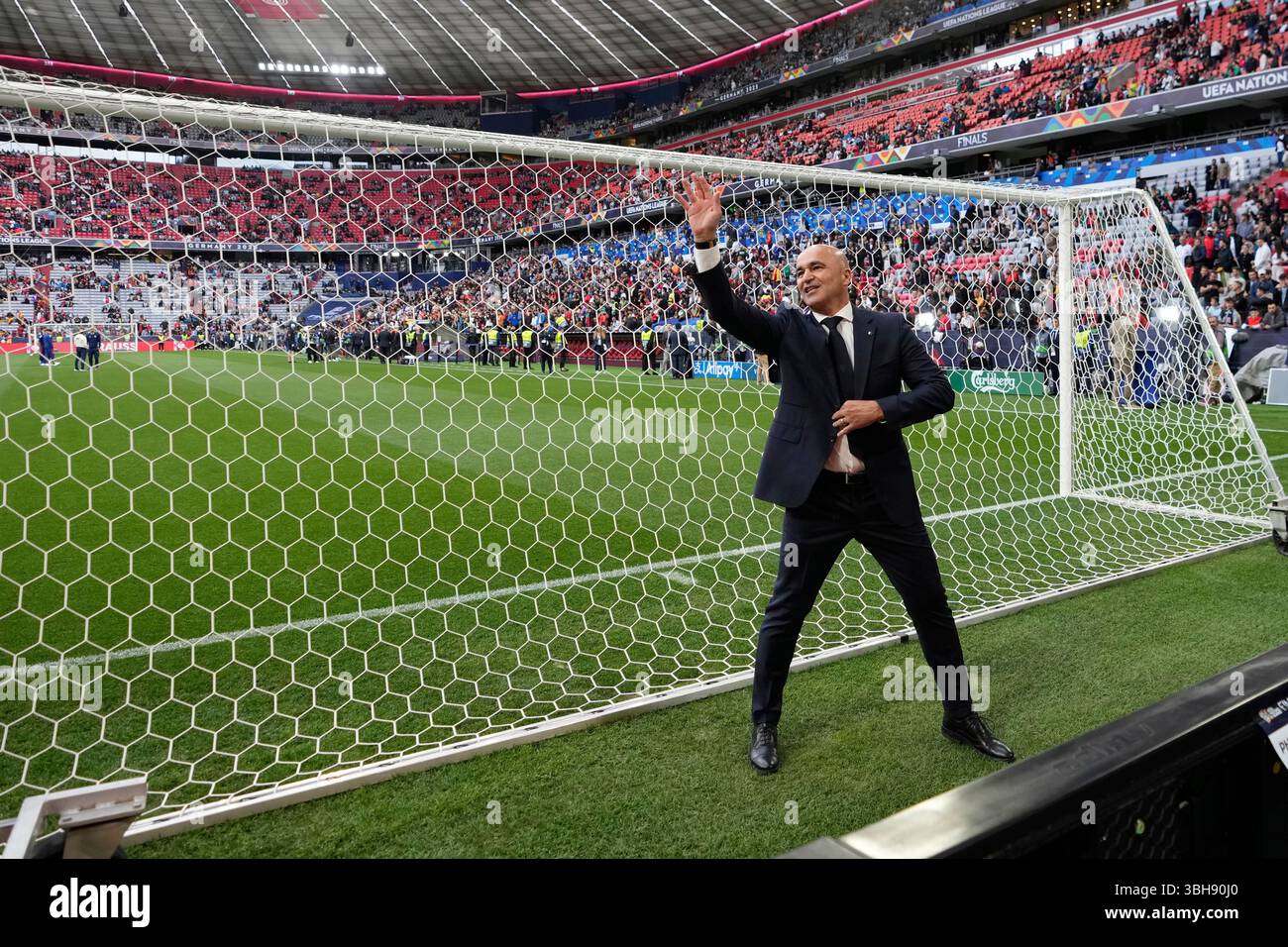 Portugal coach Roberto Martinez waves to fans prior to the Nations ...