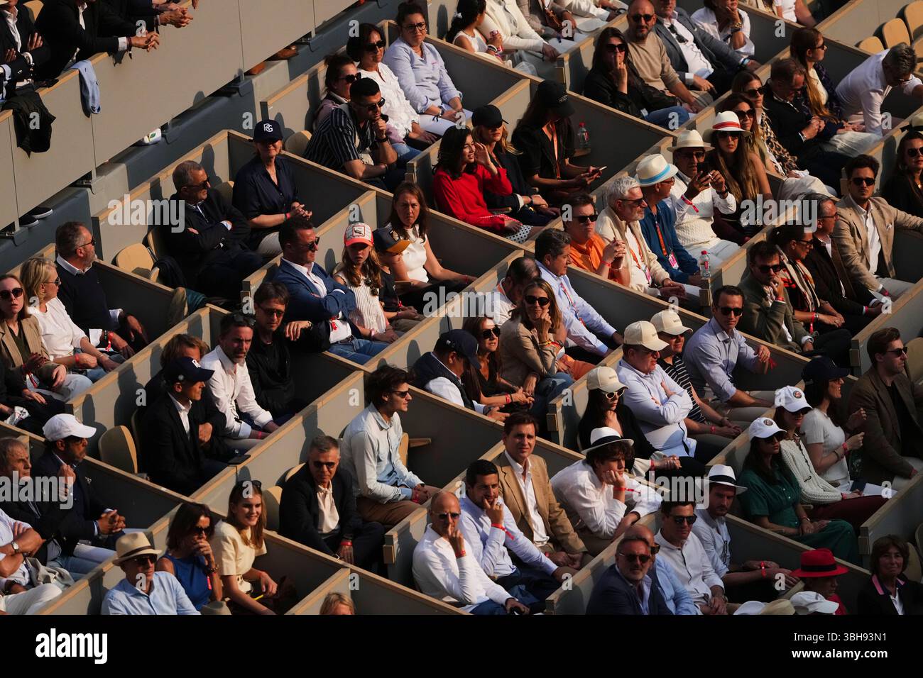 Spectators watch the final match of the French Tennis Open between ...