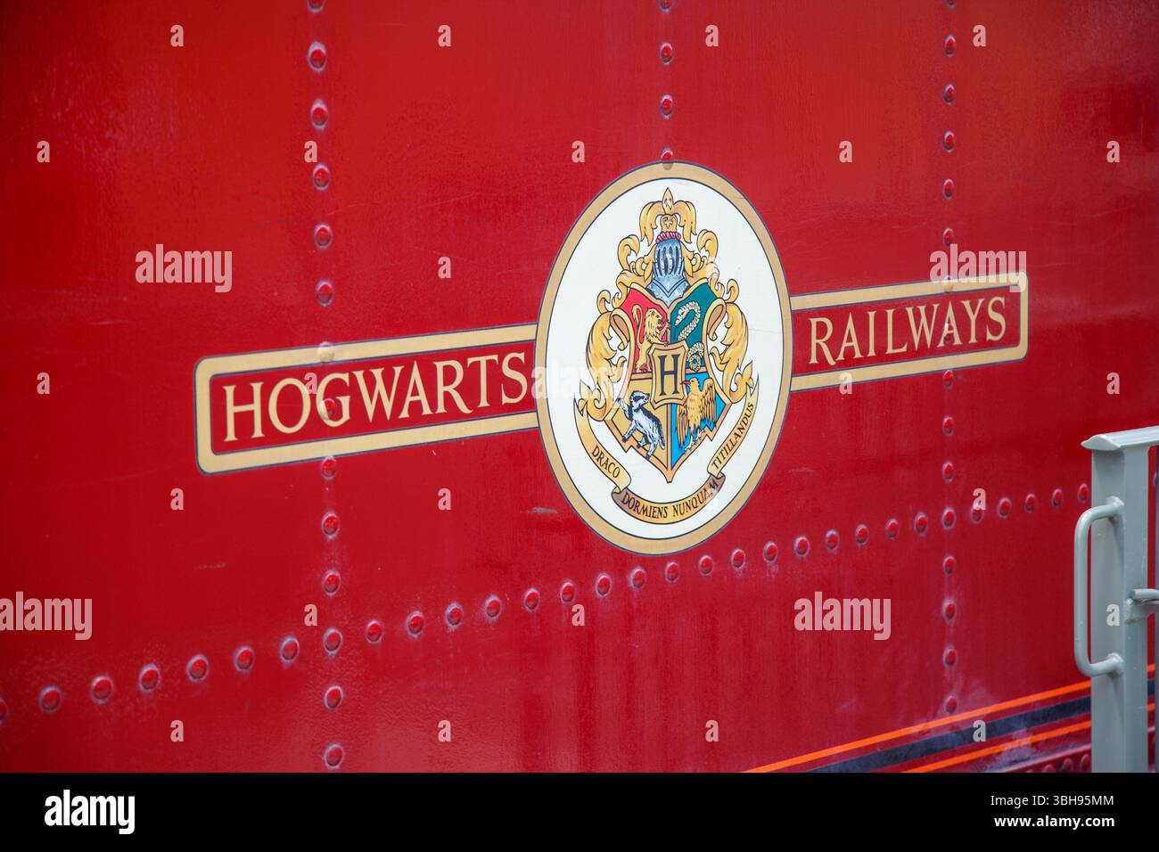 The Hogwarts Express train with Hogwarts Railways sign and coat of arms ...