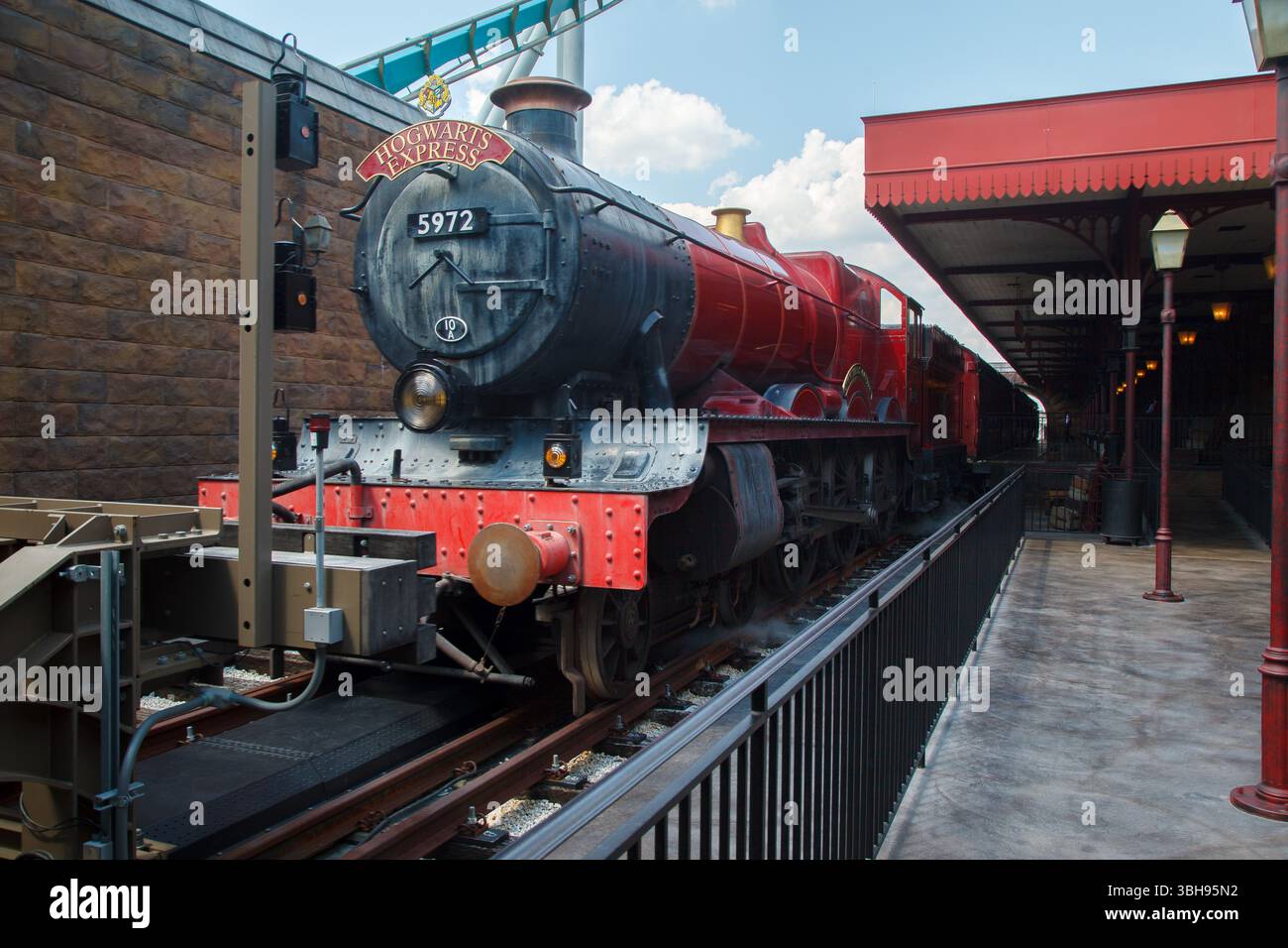 The Hogwarts Express train with Hogwarts Railways sign and coat of arms ...