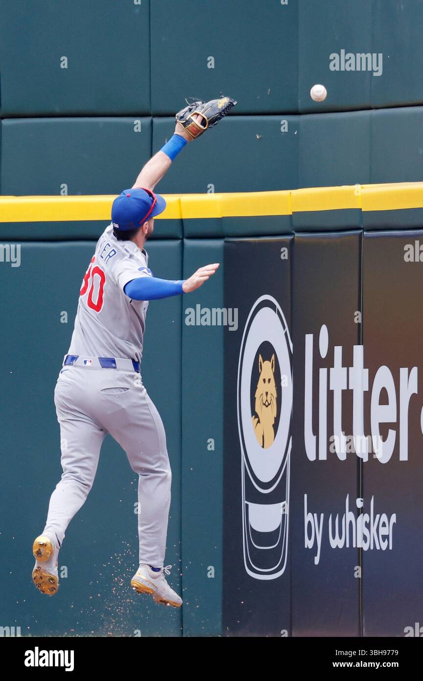 Chicago Cubs right fielder Kyle Tucker can't reach a double hit by ...