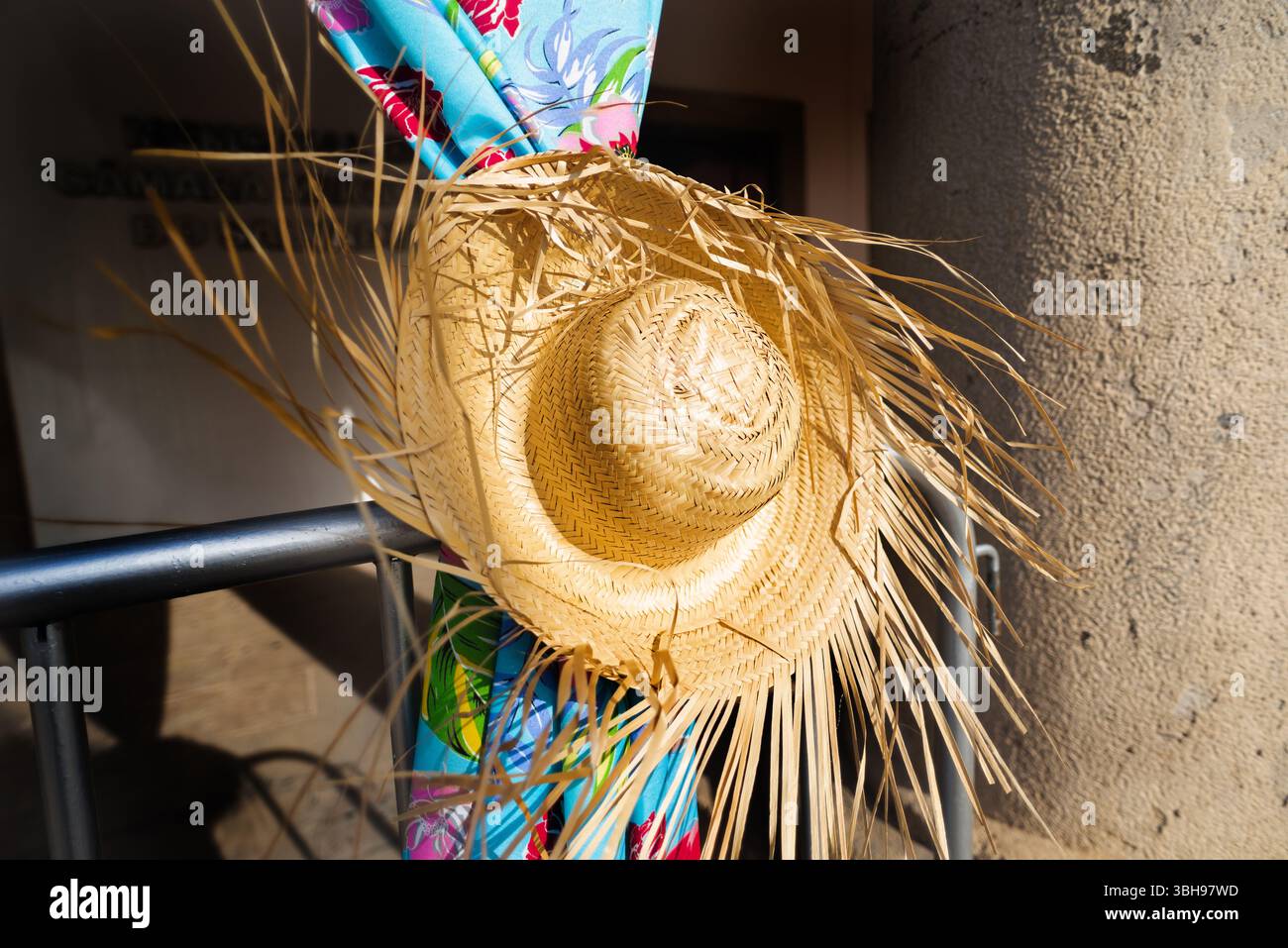 Straw hat attached to colored cloth as decoration. Feast of Saint John ...