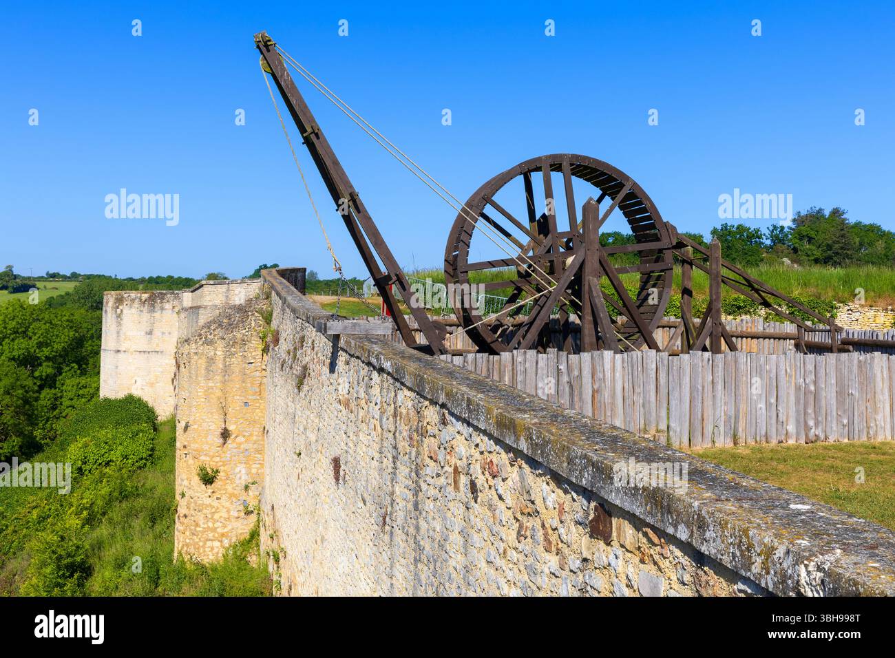 A medieval wooden treadwheel crane (magna rota) at the Chateau de ...