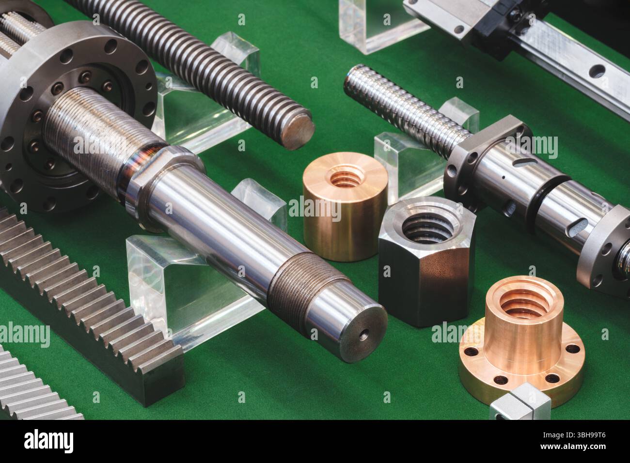 collection of gears and screws are displayed on a black background ...