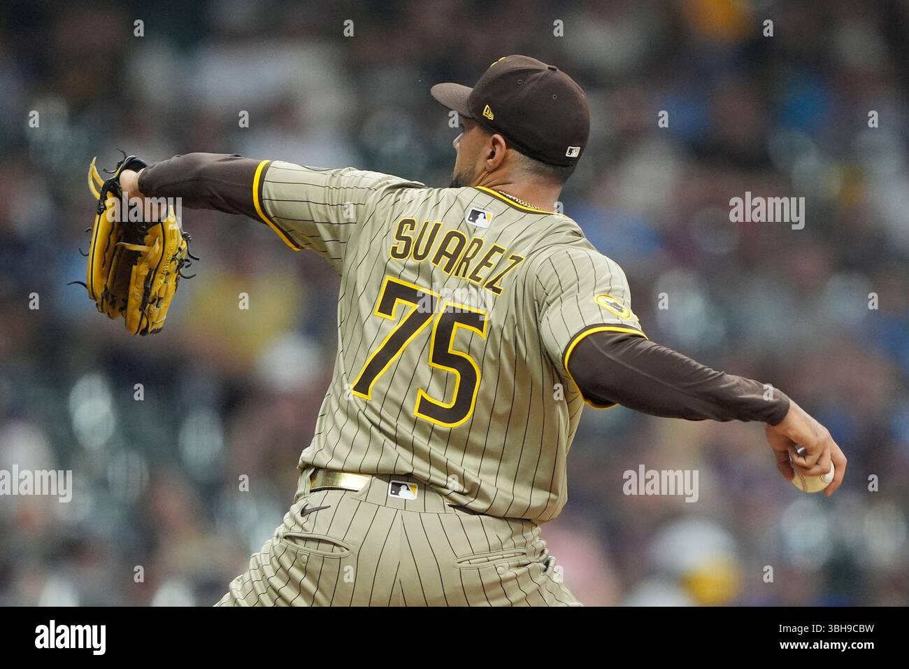 San Diego Padres' Robert Suarez pitches during the ninth inning of a ...