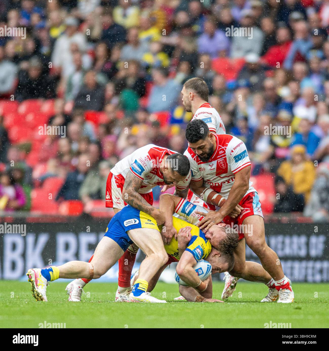 London, UK. 07th June, 2025. Matt Dufty of Warrington is tackled during ...