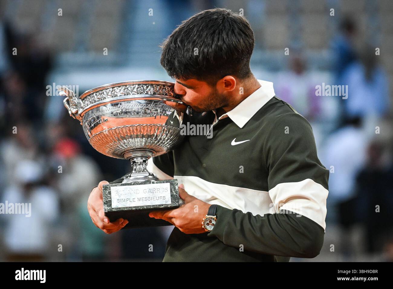Carlos ALCARAZ of Spain celebrates his victory with the trophy during ...