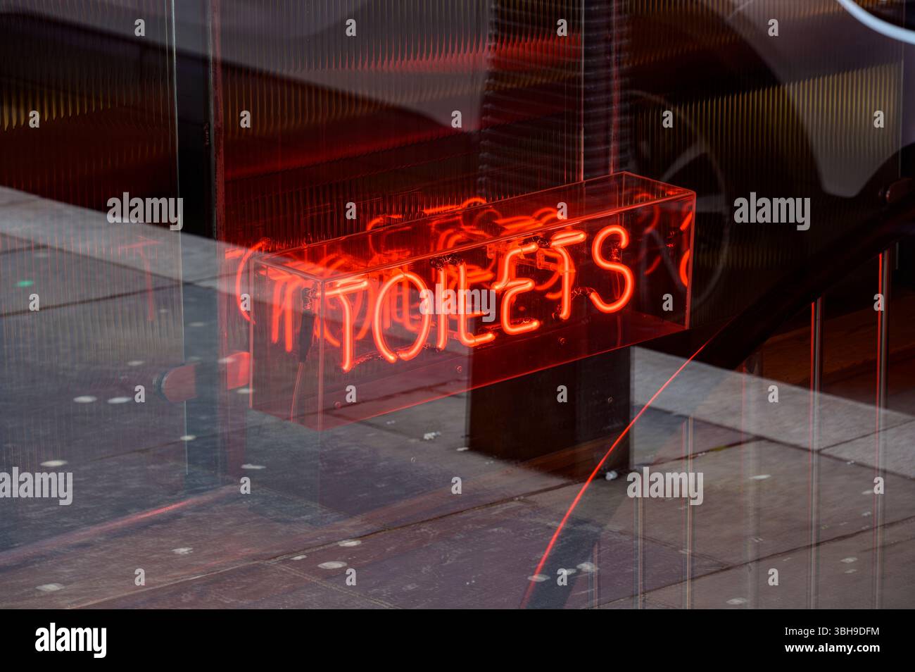 Neon toilet sign, Scotland, UK Stock Photo - Alamy