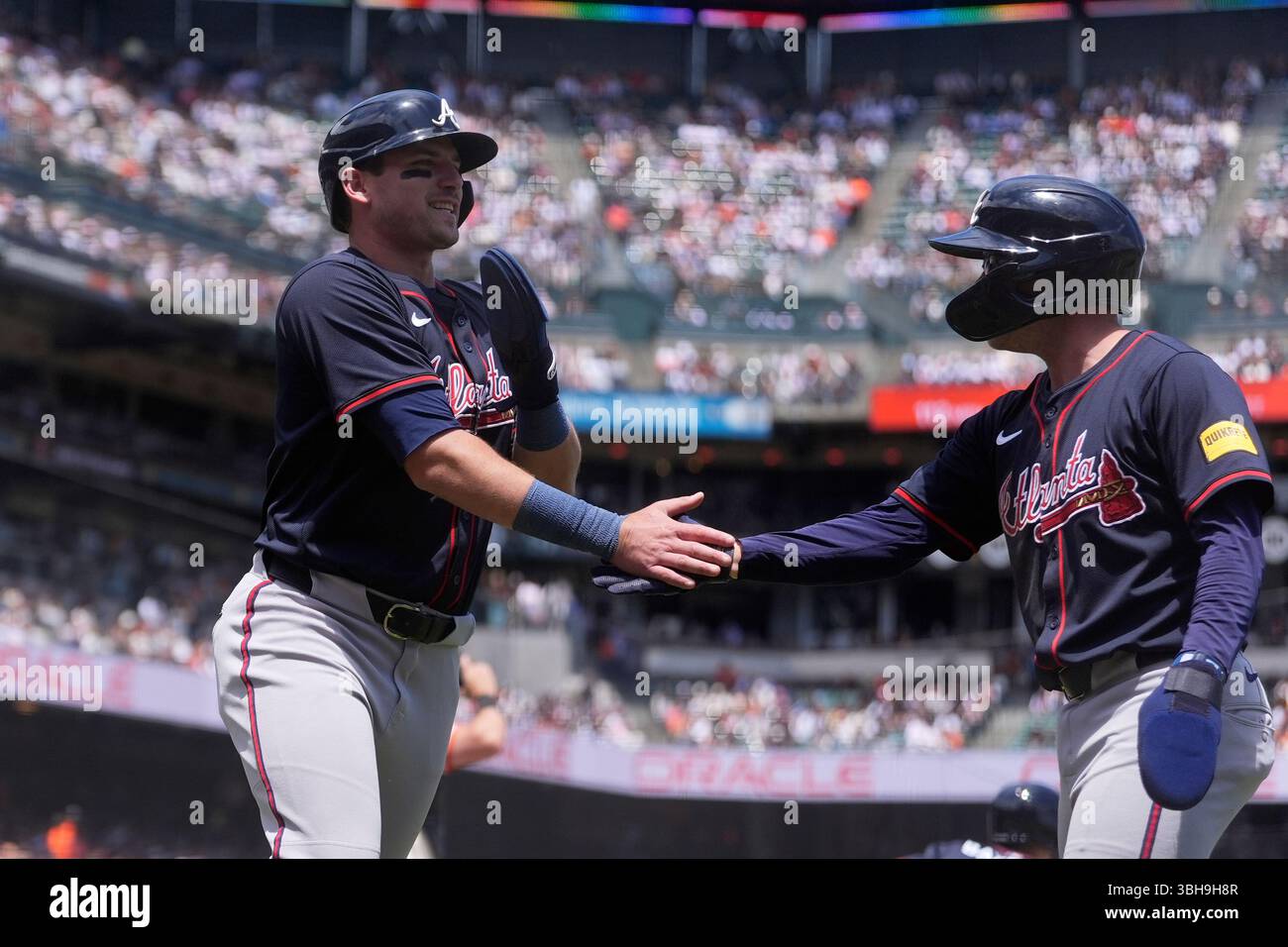 Atlanta Braves' Austin Riley, left, celebrates with Nick Allen after ...