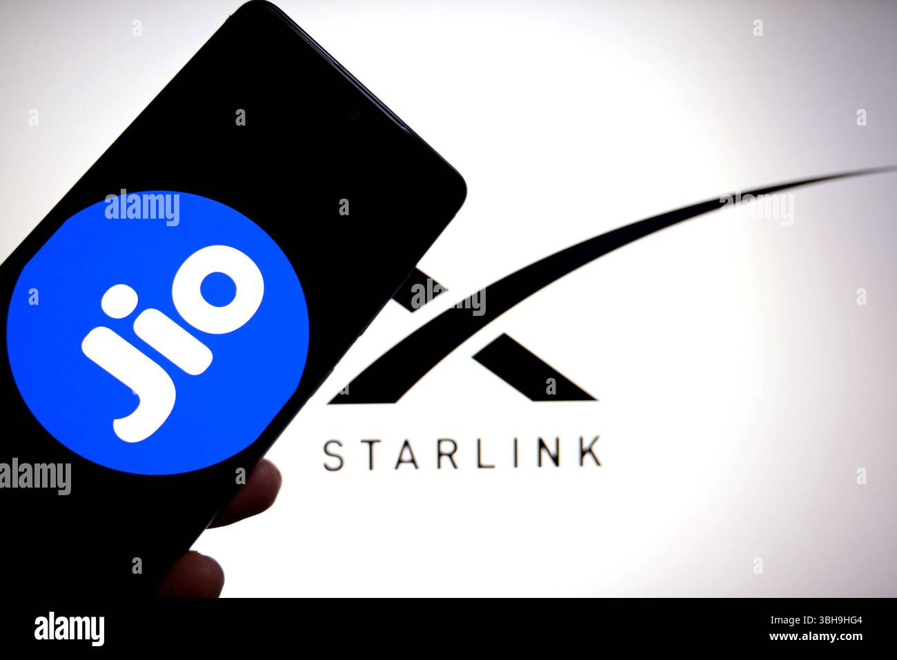 In this photo illustration, a Reliance Jio Logo is seen displayed on a ...